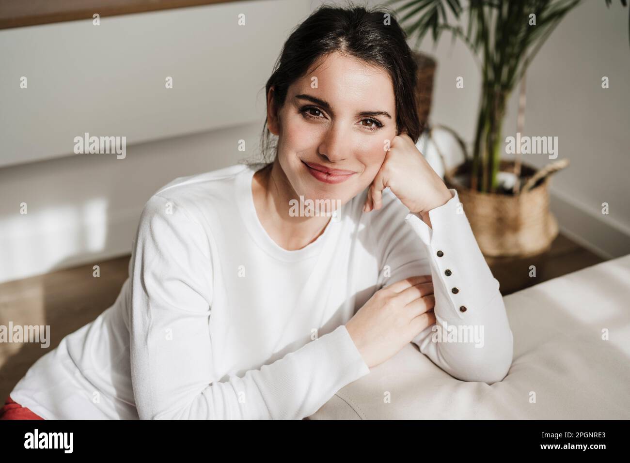 Woman leaning on elbow hi-res stock photography and images - Alamy