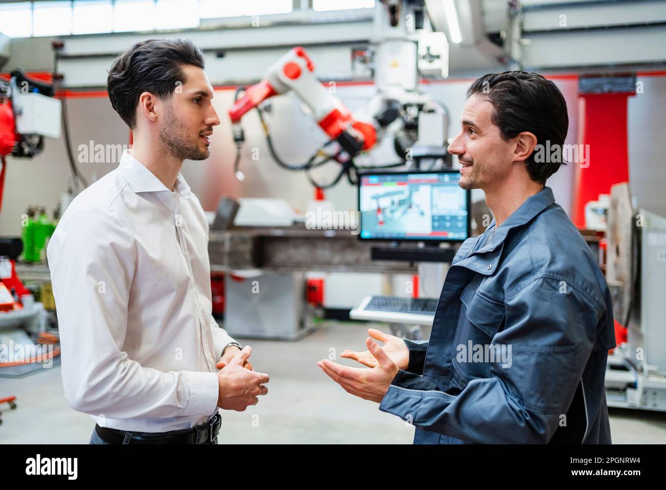 Adult man engineer talking hi-res stock photography and images - Alamy