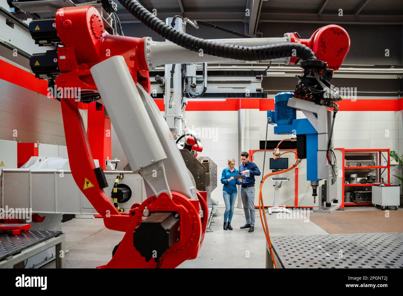 Engineering team working together in hi-res stock photography and ...
