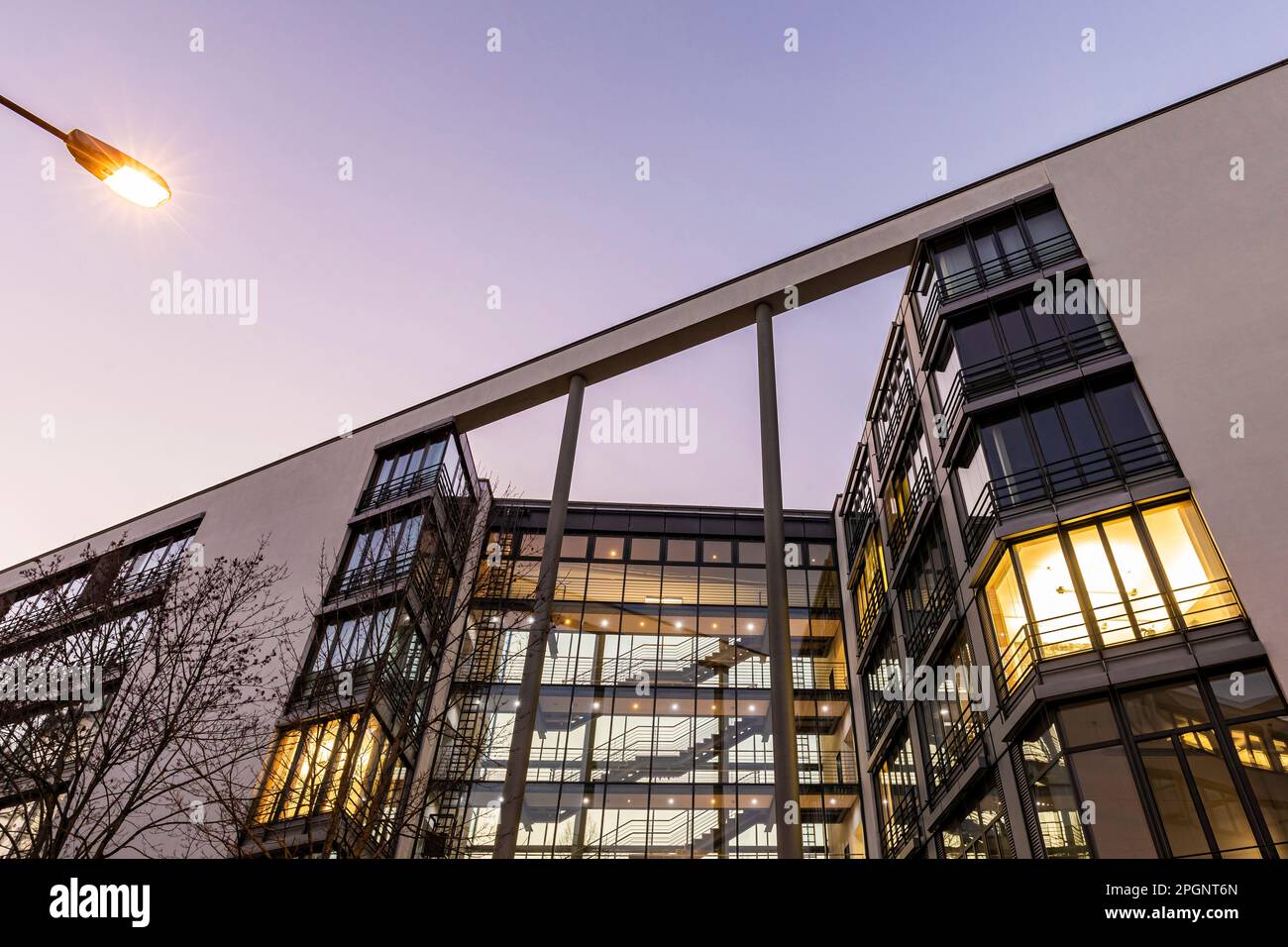 Exterior of modern office building at dusk Stock Photo - Alamy