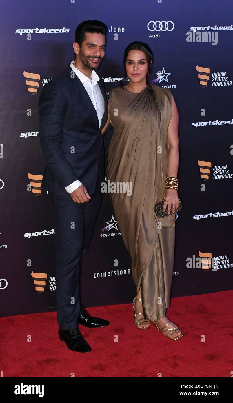 Mumbai, India. 23rd Mar, 2023. L-R Bollywood actor Angad Bedi and his actress wife Neha Dhupia ...