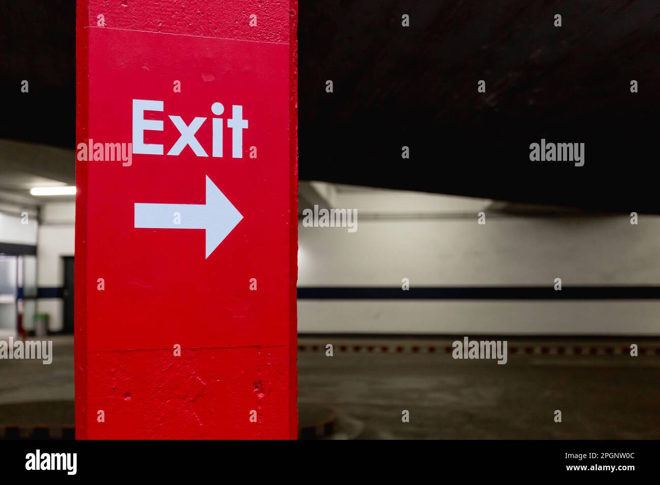 Exit sign in parking lot Stock Photo - Alamy