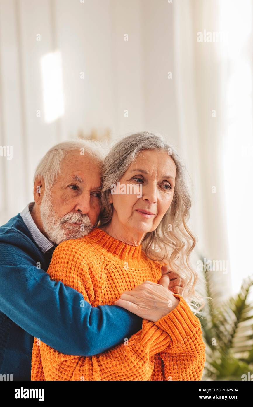 Two women hugging home hi-res stock photography and images - Alamy