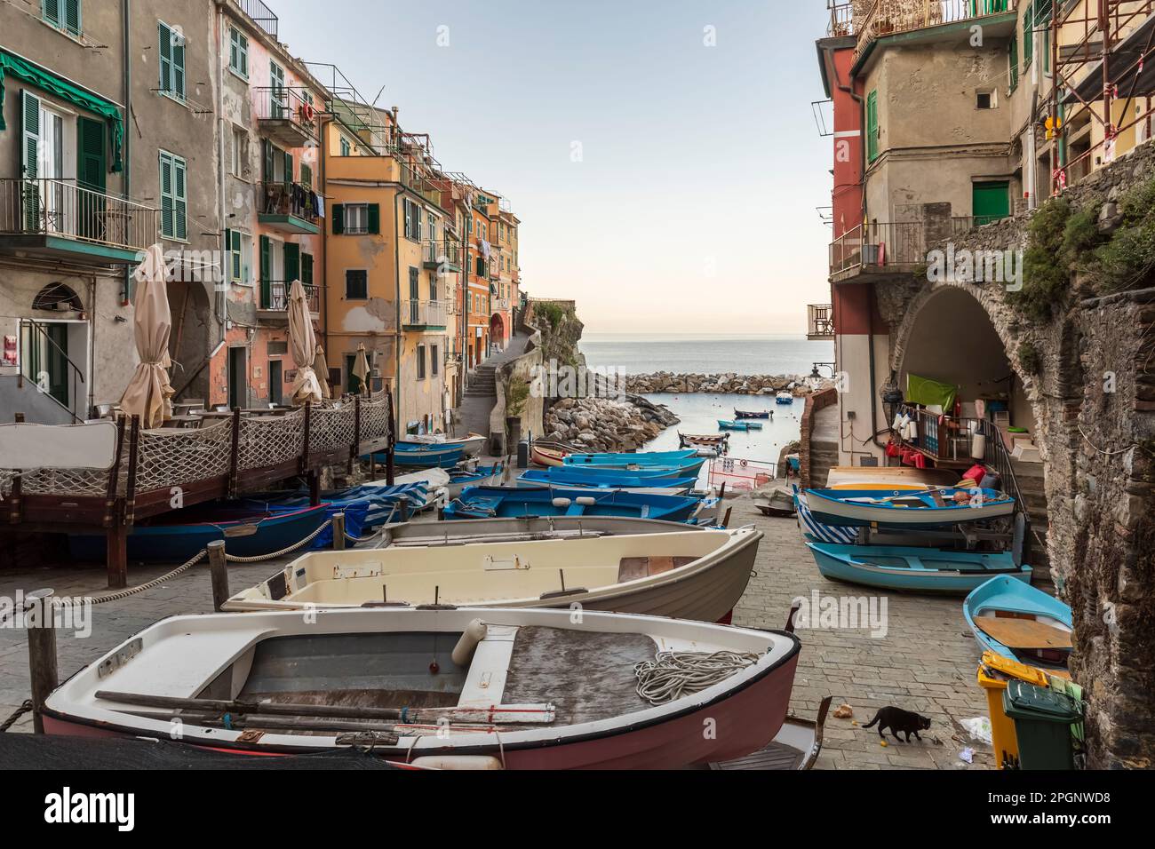 Row boats lying edge coastal town along cinque terre hi-res stock ...