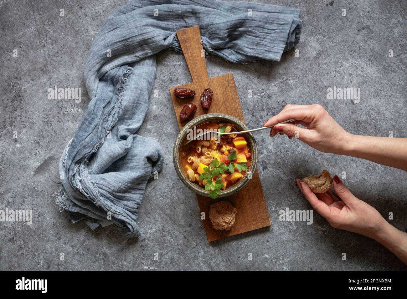 Hands woman eating bowl north african stew pumpkin hi-res stock ...