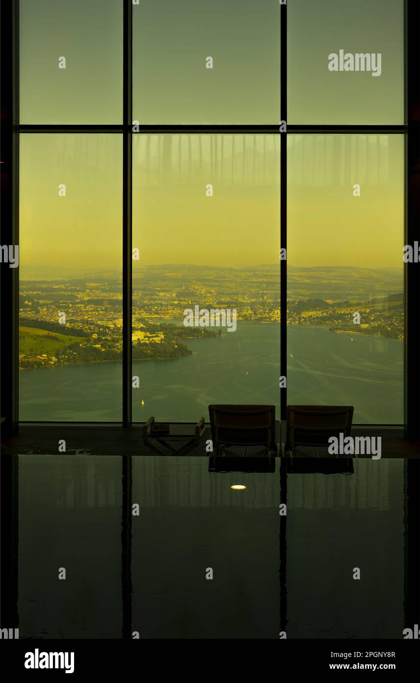 Infinity Swimming Pool with Window View over City and Lake Lucerne in ...