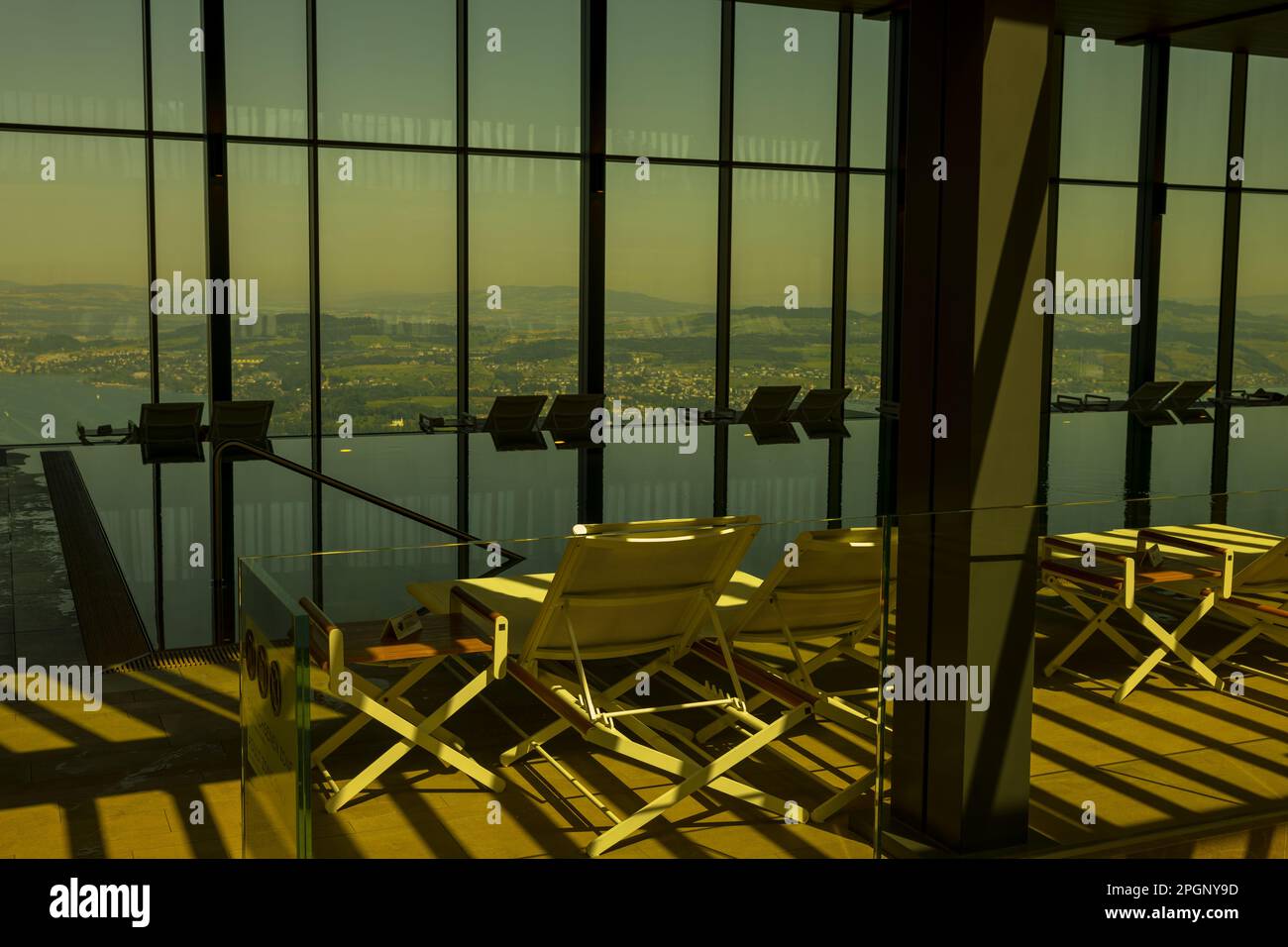 Infinity Swimming Pool with Window View over City and Lake Lucerne in ...