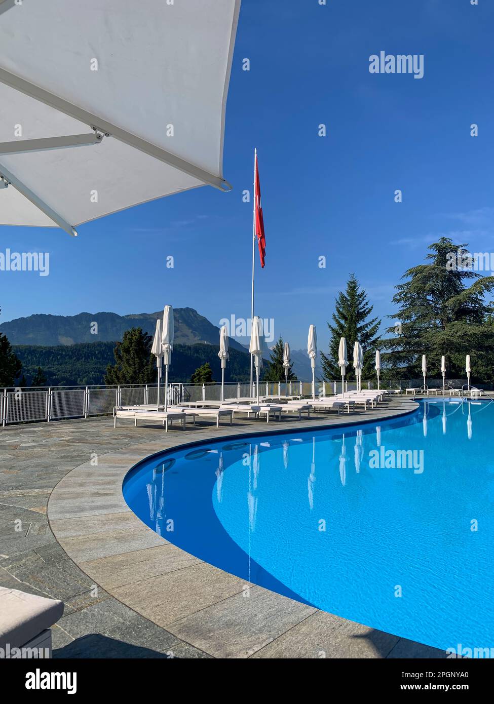 Swimming Pool with Mountain View in a Sunny Day in Burgenstock ...