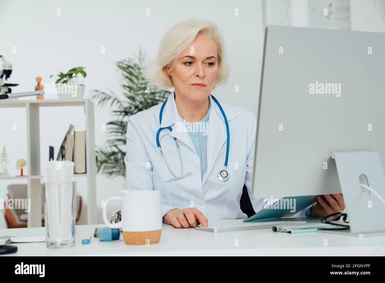 Doctor working table focus hi-res stock photography and images - Alamy