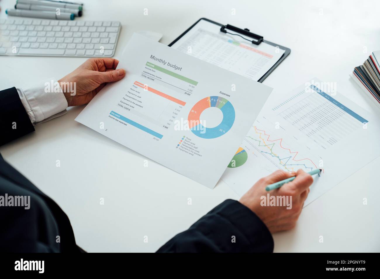 Businesswoman working documents document hi-res stock photography and ...