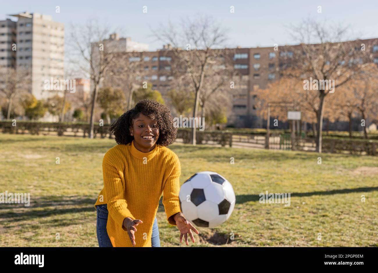 Woman catching ball hi-res stock photography and images - Alamy