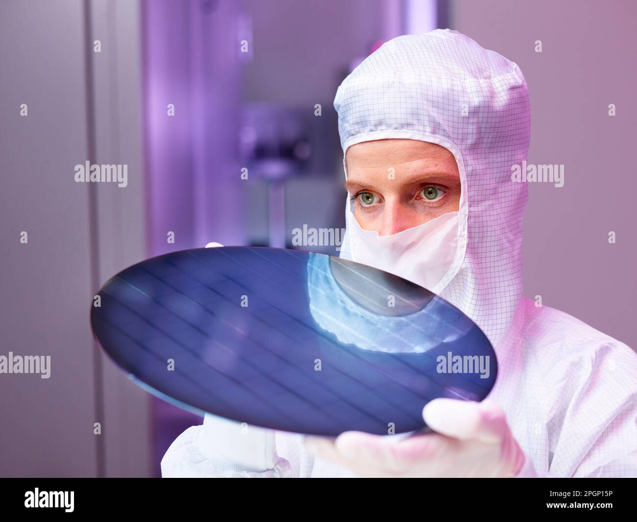 Engineer examining wafer chip in laboratory Stock Photo - Alamy