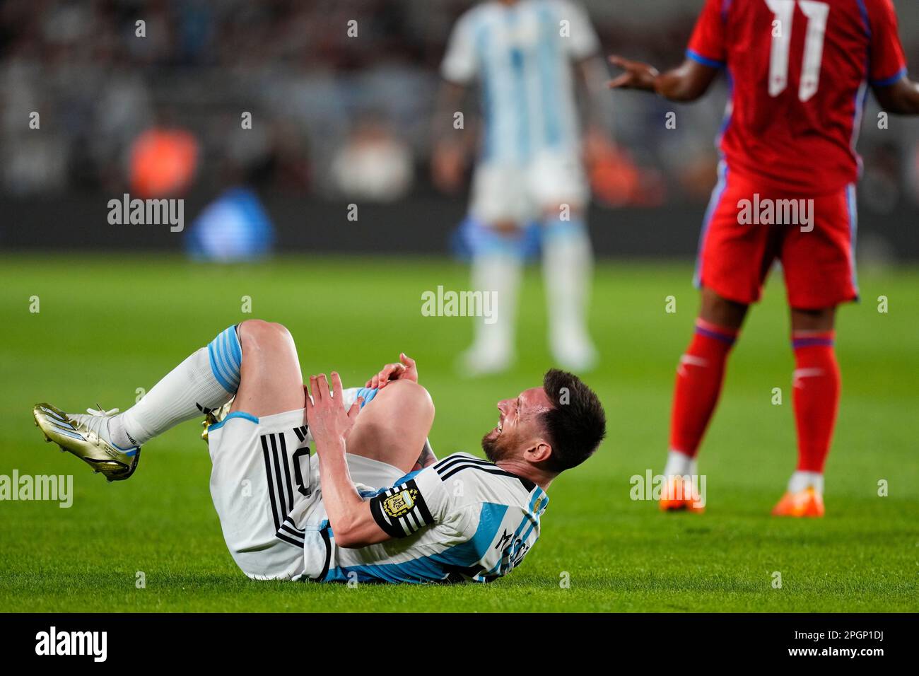 Argentina's Lionel Messi grimaces after being fouled by Panama's Kevin ...