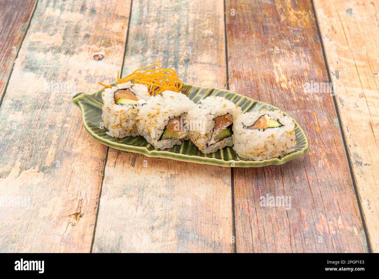 Philly Roll is a variant of sushi, whose characteristic ingredient is ...