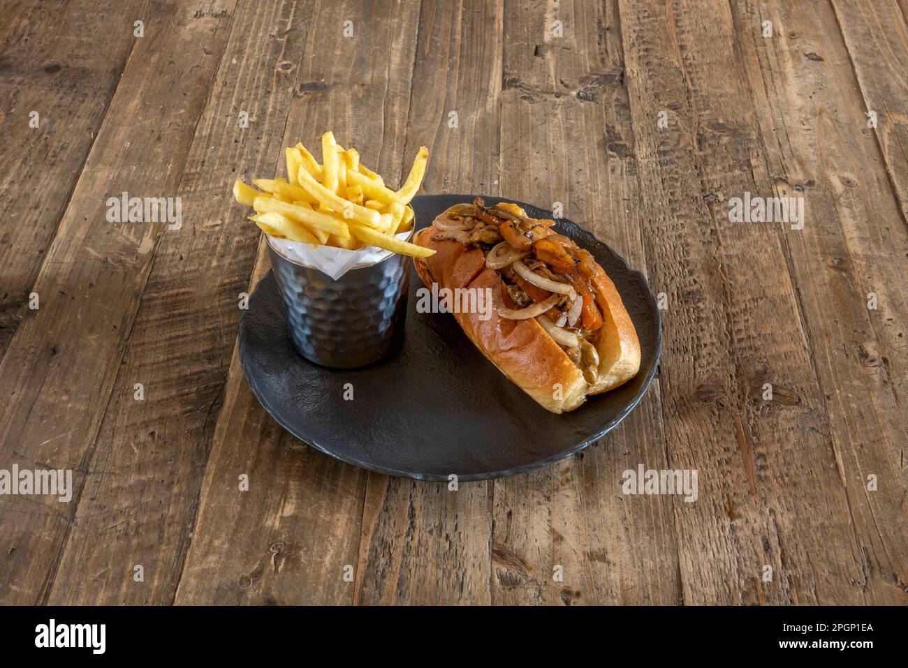 sandwich contains small strips of meat (steak) and a small amount of ...