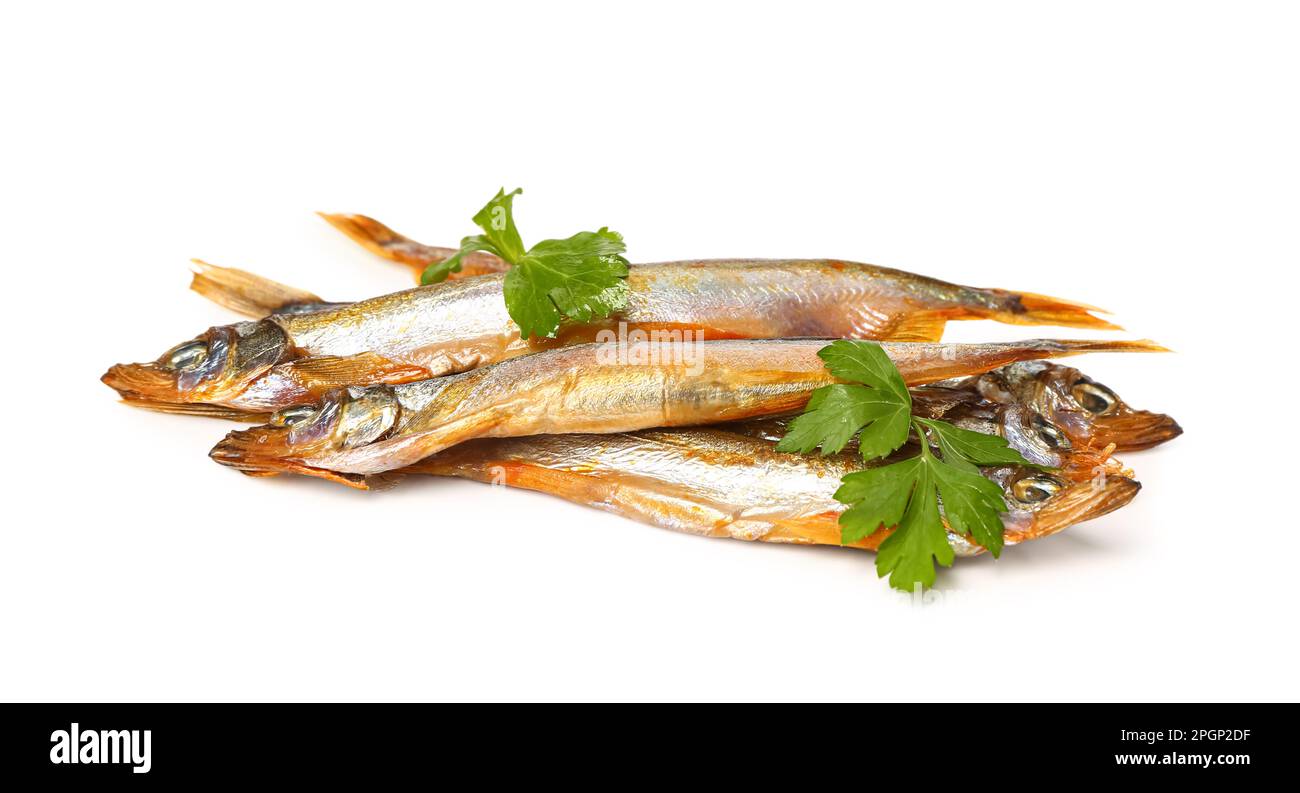 Delicious smoked capelin with parsley isolated on white background ...