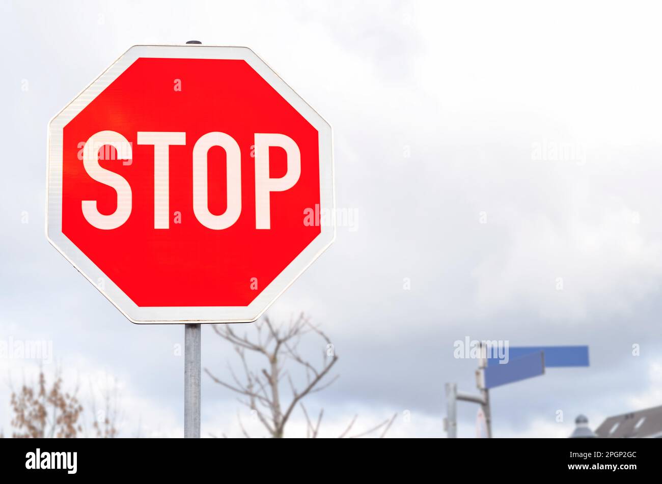 STOP sign in city, closeup Stock Photo - Alamy