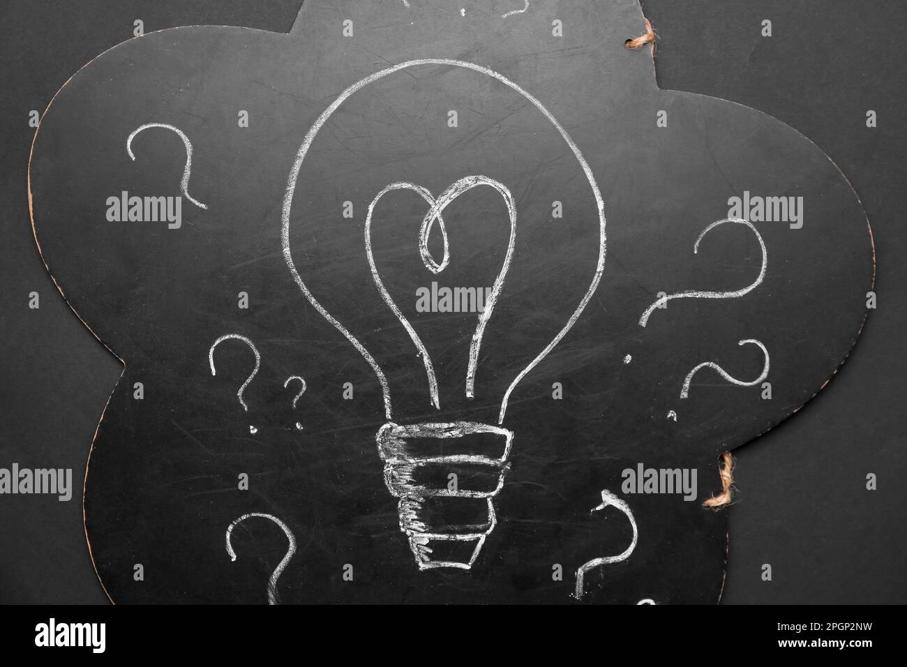 Question marks light bulb idea hi-res stock photography and images - Alamy