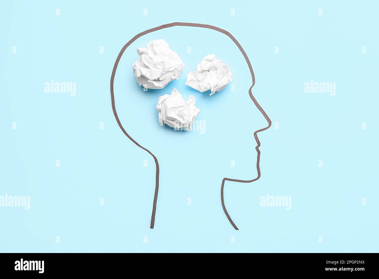 Drawn human head with crumpled paper on blue background. Insight ...