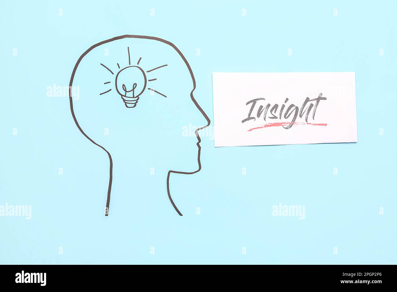 Drawn human head with light bulb and word INSIGHT on blue background ...
