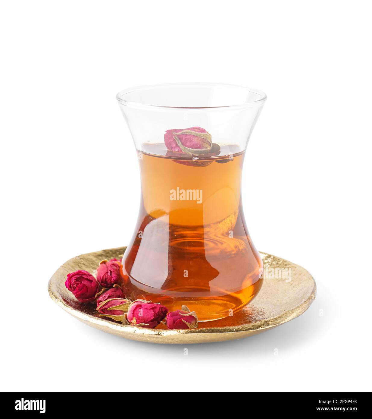 Glass cup of Turkish tea with dry roses on white background Stock Photo ...