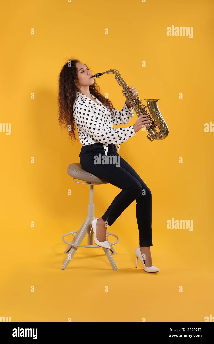 African american girl playing stool hi-res stock photography and images ...