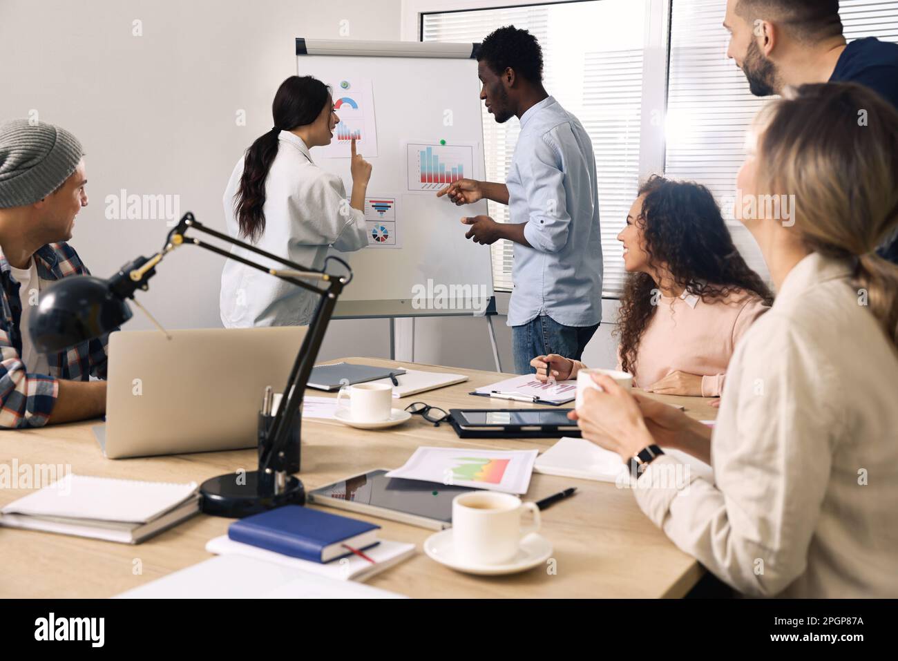 Team of employees working together in office. Startup project Stock ...
