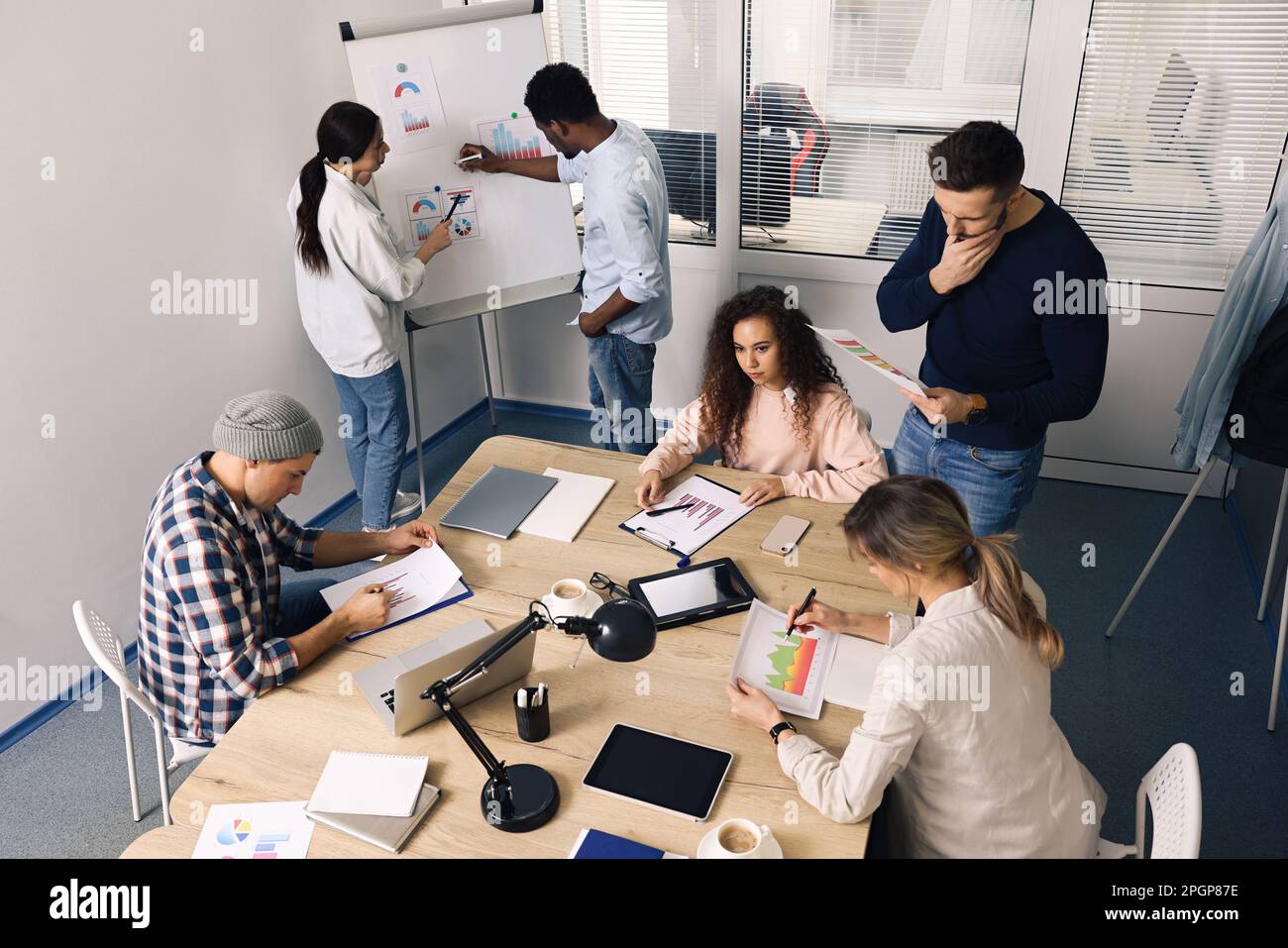 Team of employees working together in office. Startup project Stock ...