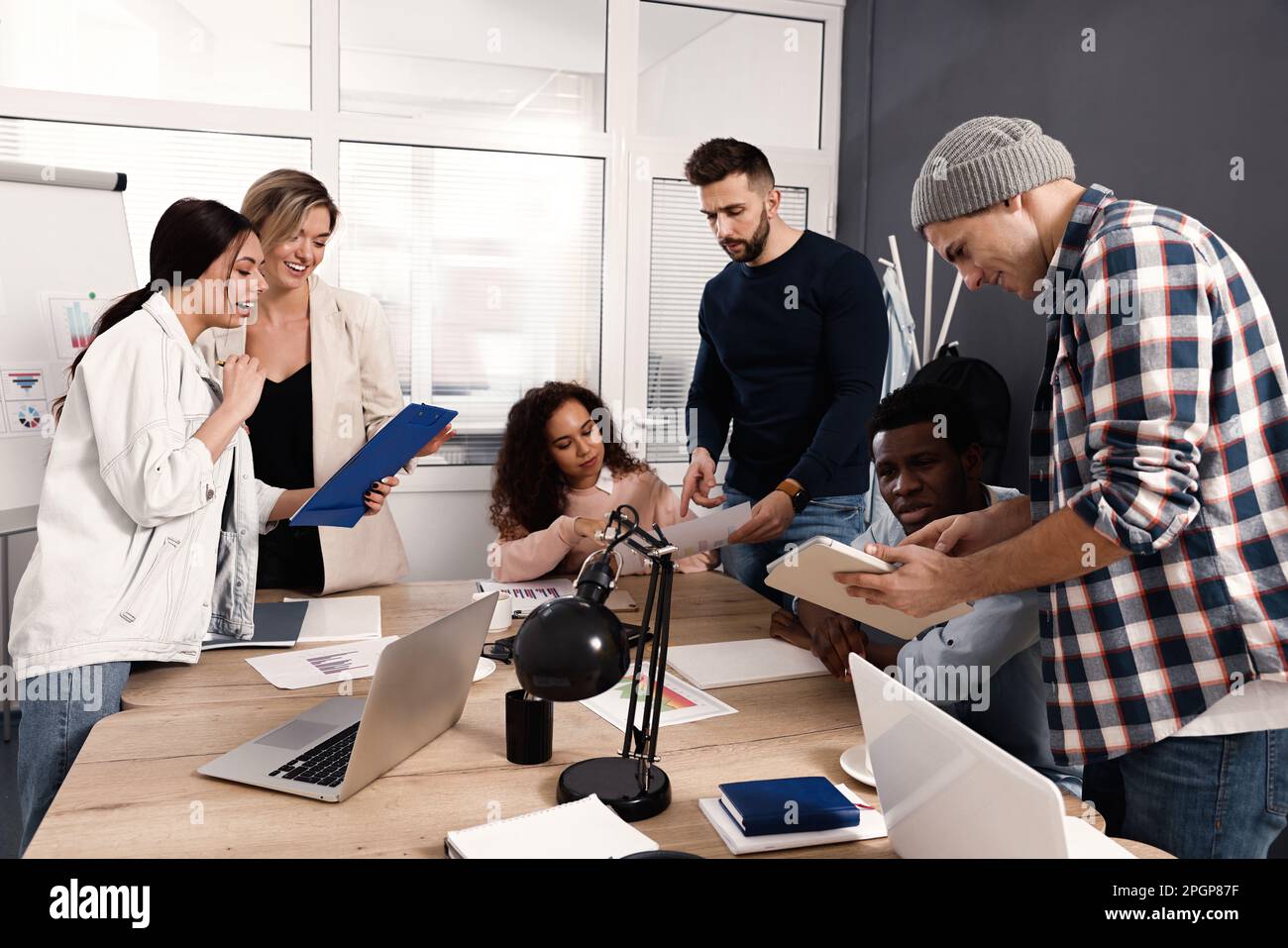 Team of employees working together in office. Startup project Stock ...