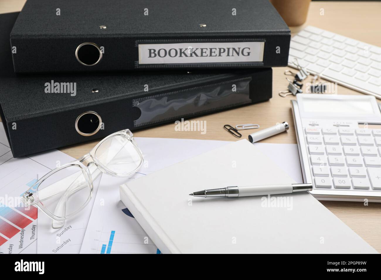 Bookkeeper's workplace with folders and documents on table Stock Photo ...