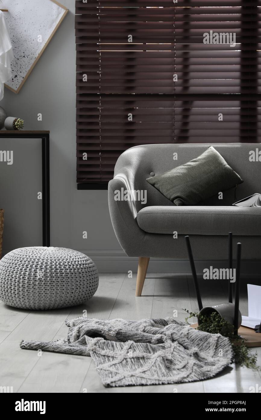 Chaotic living room interior after strong earthquake Stock Photo - Alamy