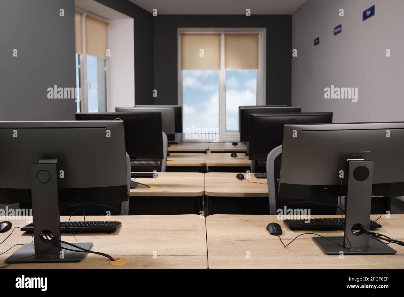 Rows of computers in empty office hi-res stock photography and images ...