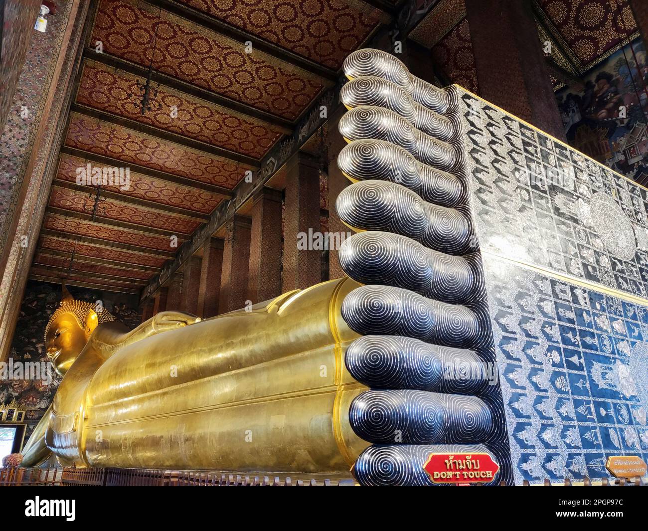Gigantic Reclining Buddha statue in Wat Pho, Bangkok. Wat Pho is the oldest and largest temple ...