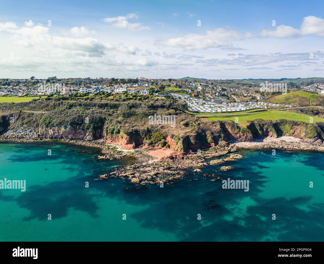 Armchair Cove and Waterside Holiday Park from a drone, Broadsands Beach ...