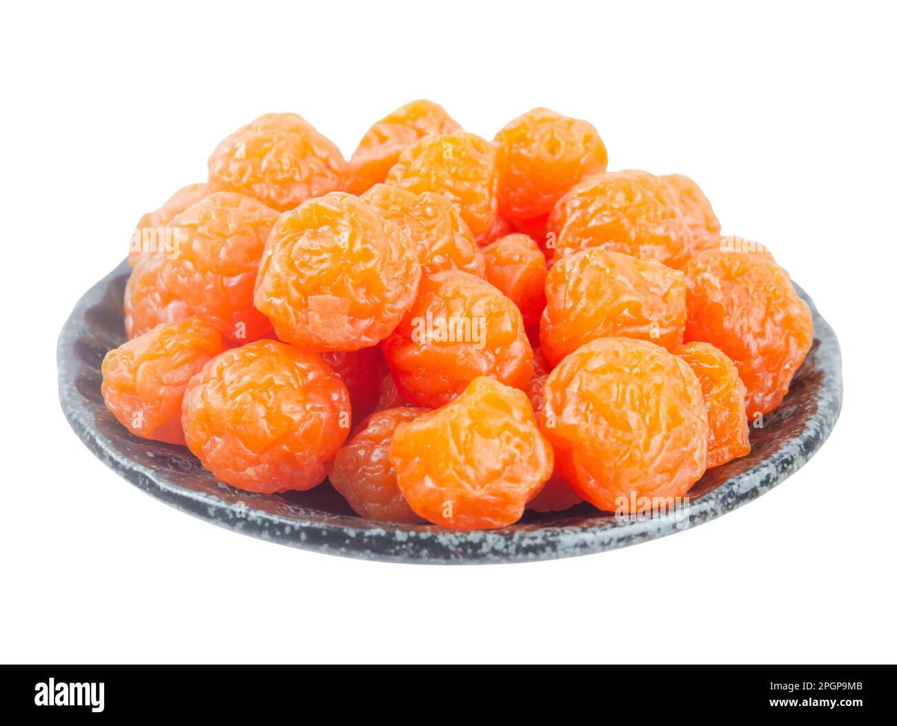 Preserved fruits or dried honey Chinese plum on dish isolated on white ...