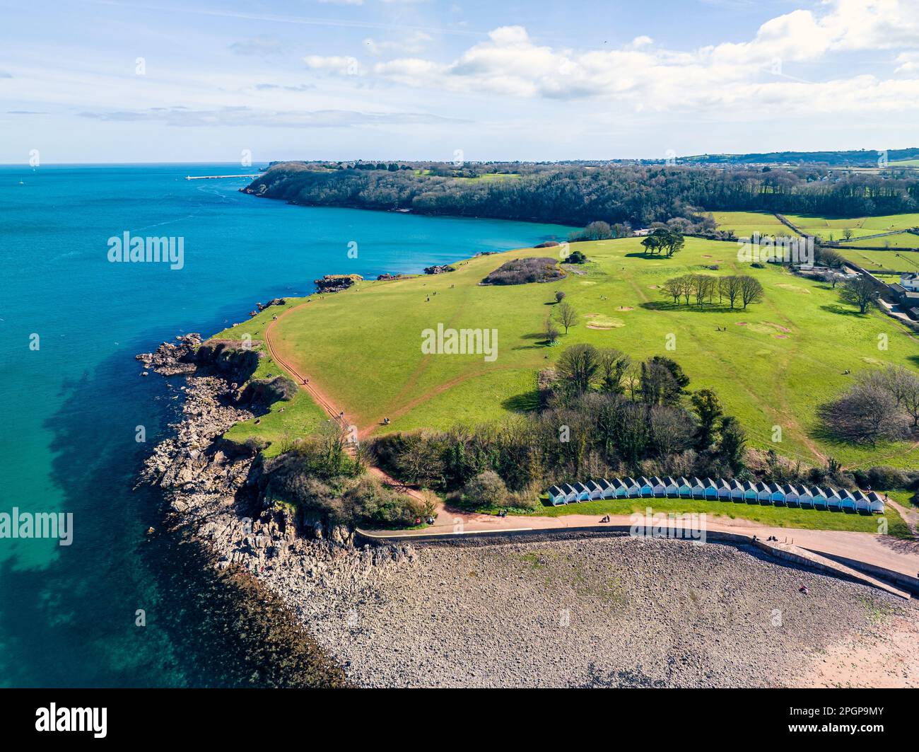 Aerial view of Cliffs and Broadsands Beach from a drone, Paignton ...