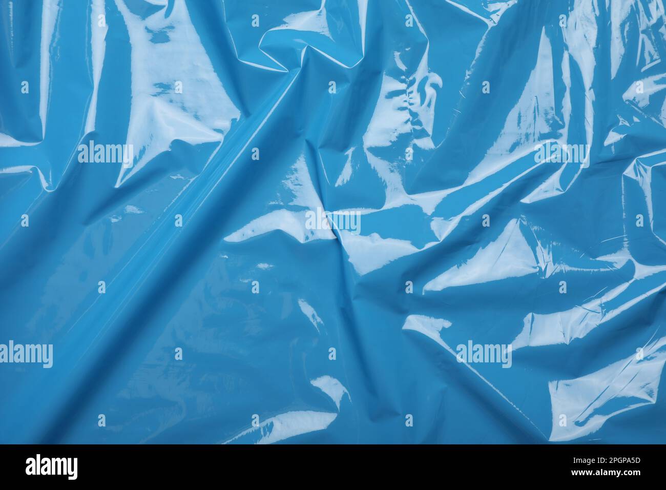 Light blue plastic stretch wrap film as background, top view Stock ...