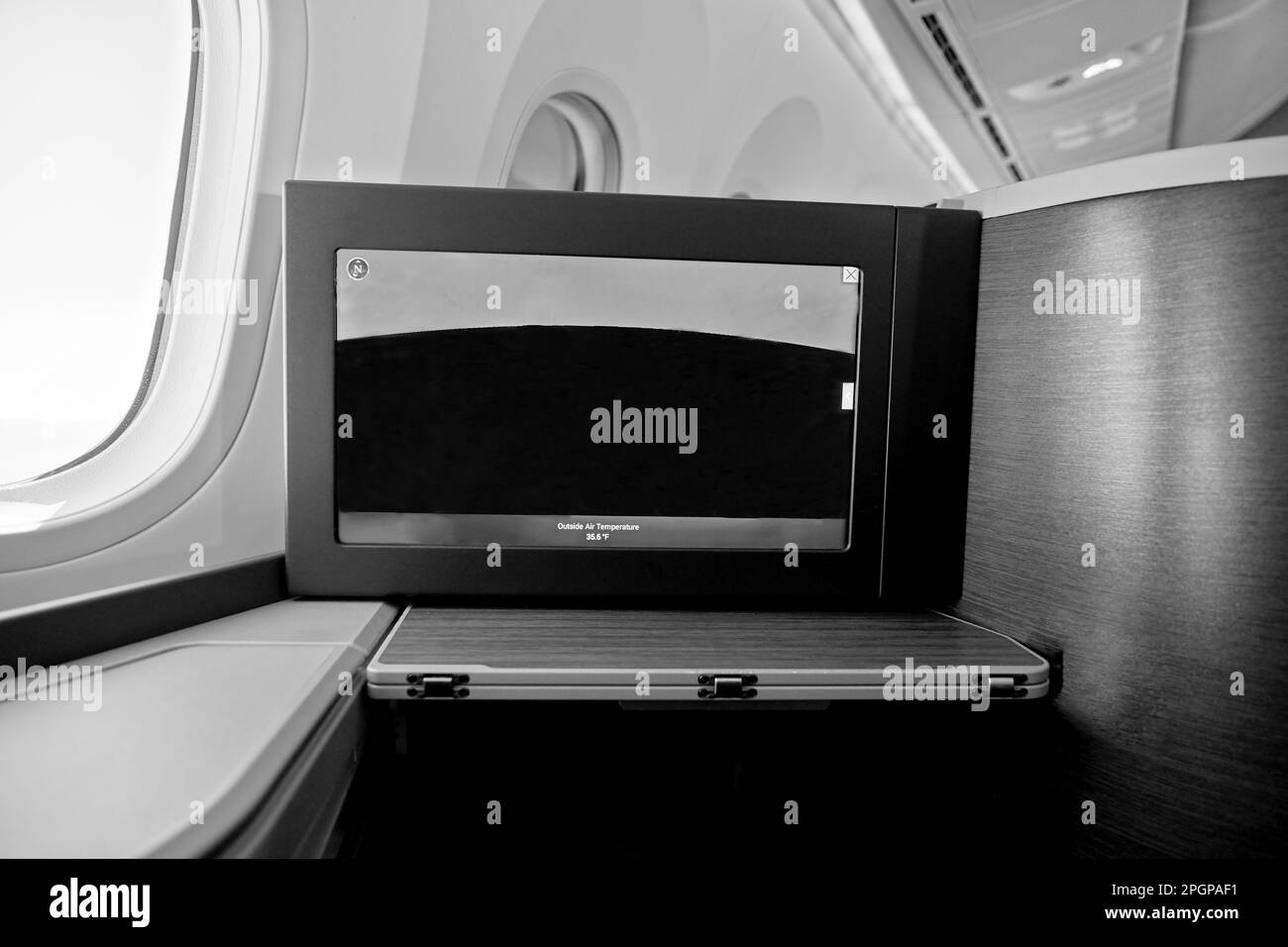First Class Seating on Airplane with Lay Flat Seats Stock Photo - Alamy