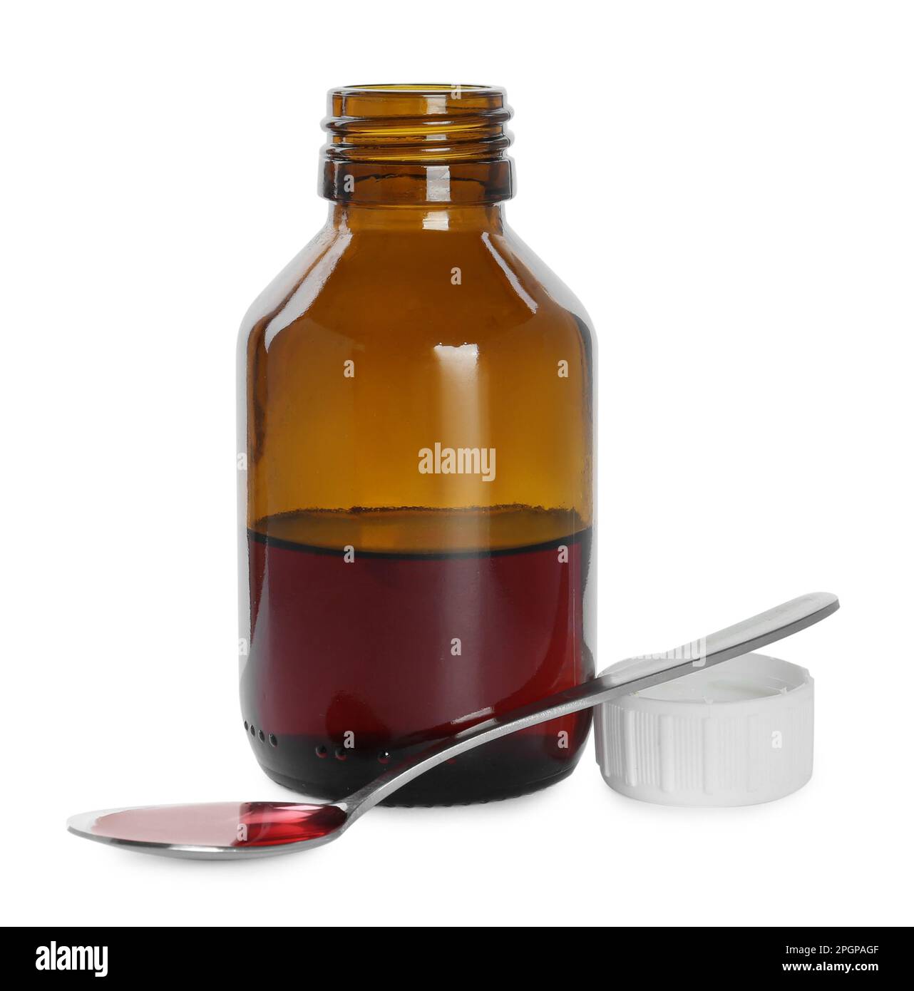 Bottle of cough syrup and spoon on white background Stock Photo - Alamy