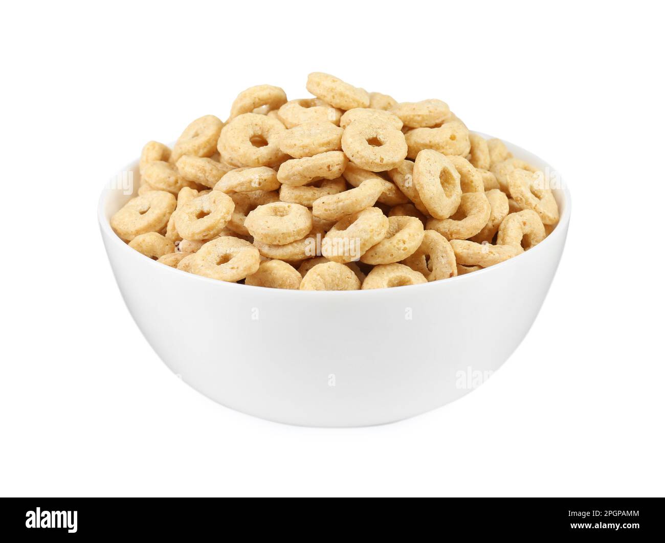 Bowl of sweet crispy corn rings on white background. Breakfast cereal ...