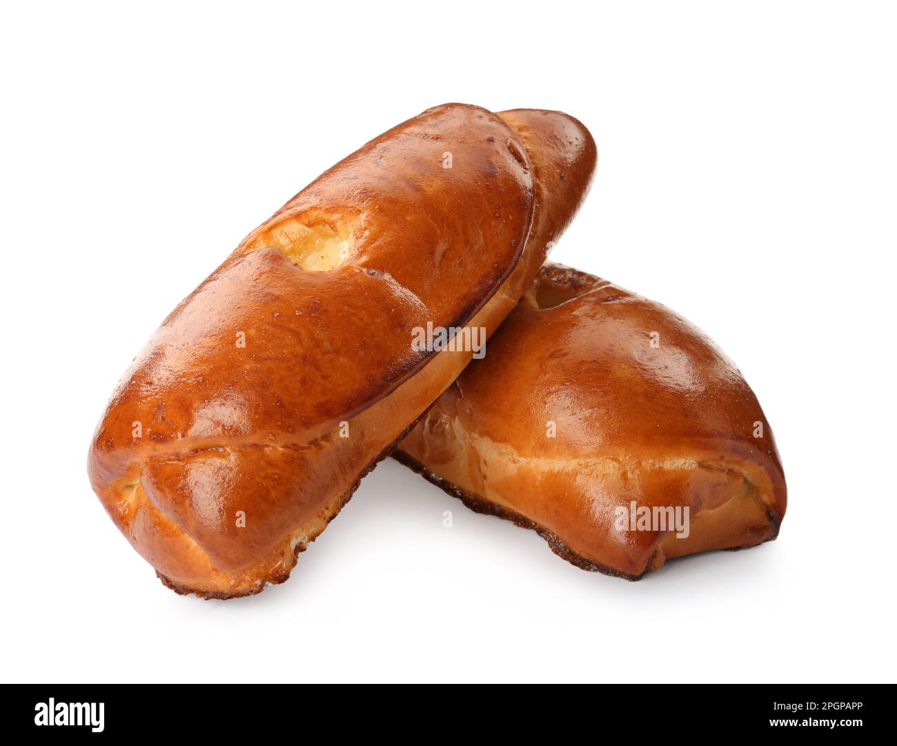 Two delicious baked patties with filling on white background Stock ...