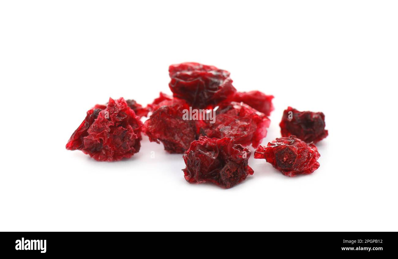 Pile of dried red currants on white background Stock Photo - Alamy