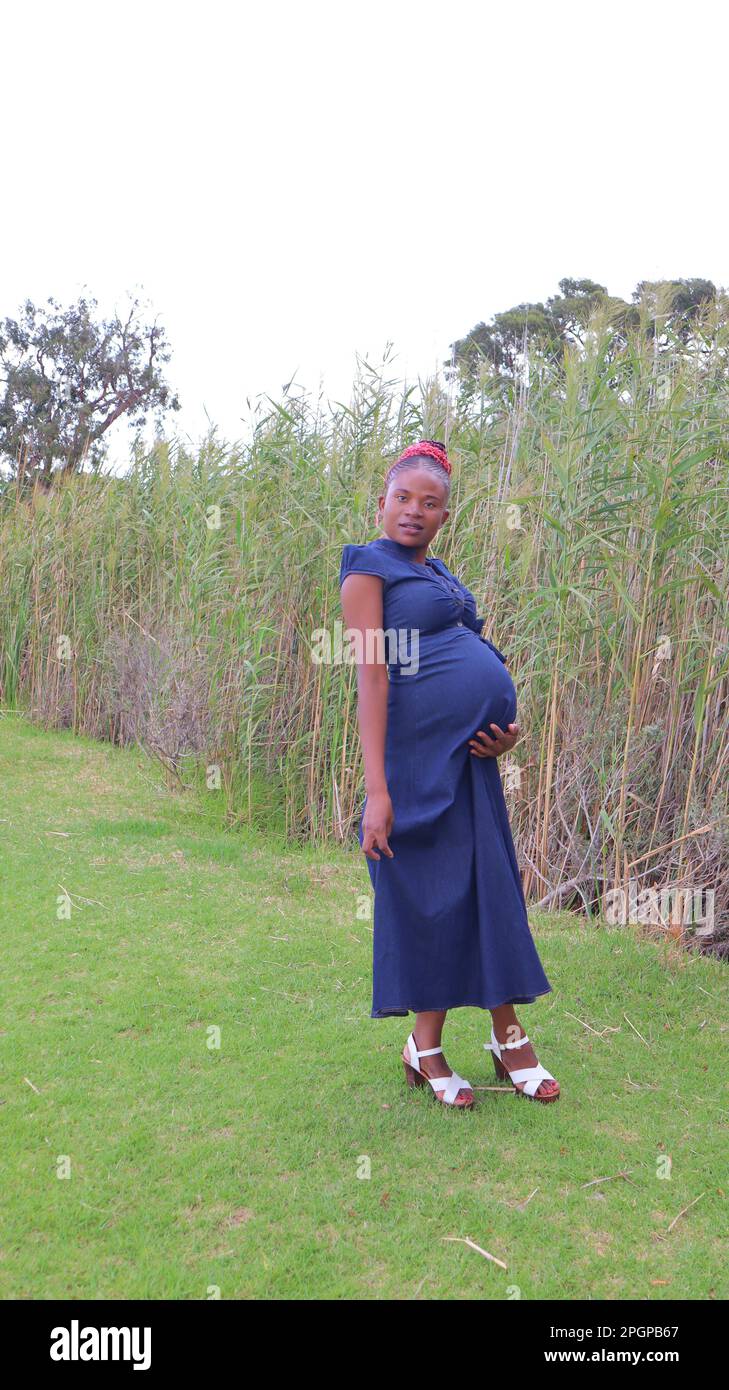 Pregnancy bump african woman hi-res stock photography and images - Alamy