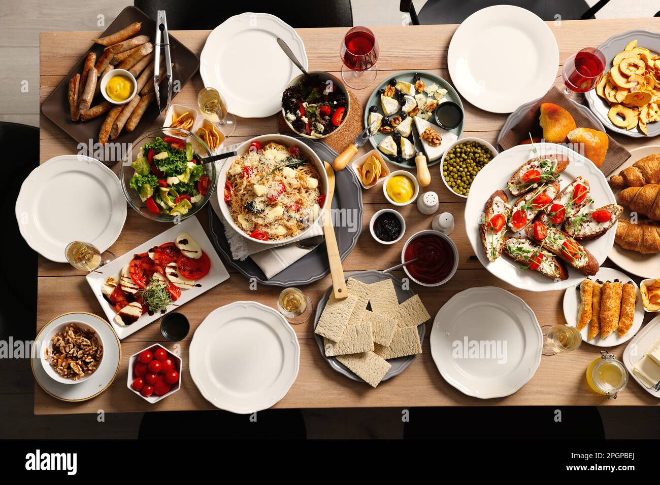 Brunch table setting with different delicious food indoors, top view ...