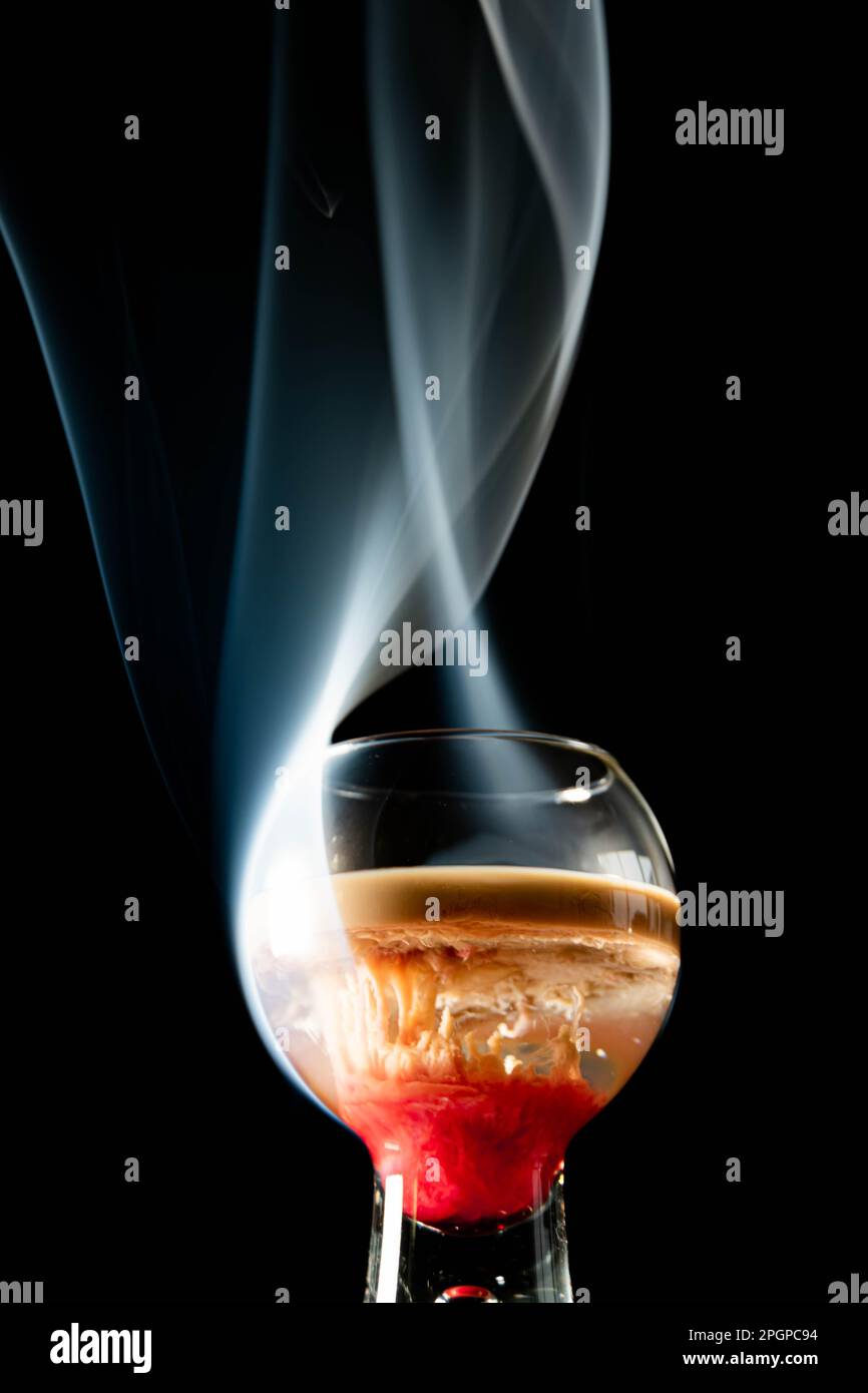 Cocktail. Drink shot based on cream, liqueur and grenadine called Brain ...