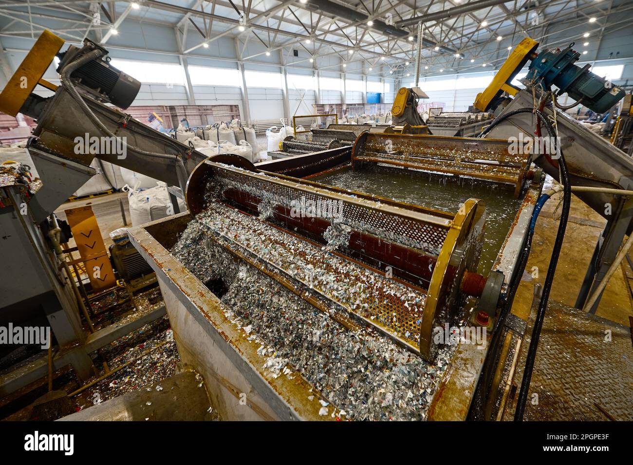 Automatic shredded plastic washing machine. Washing in a bath of water ...
