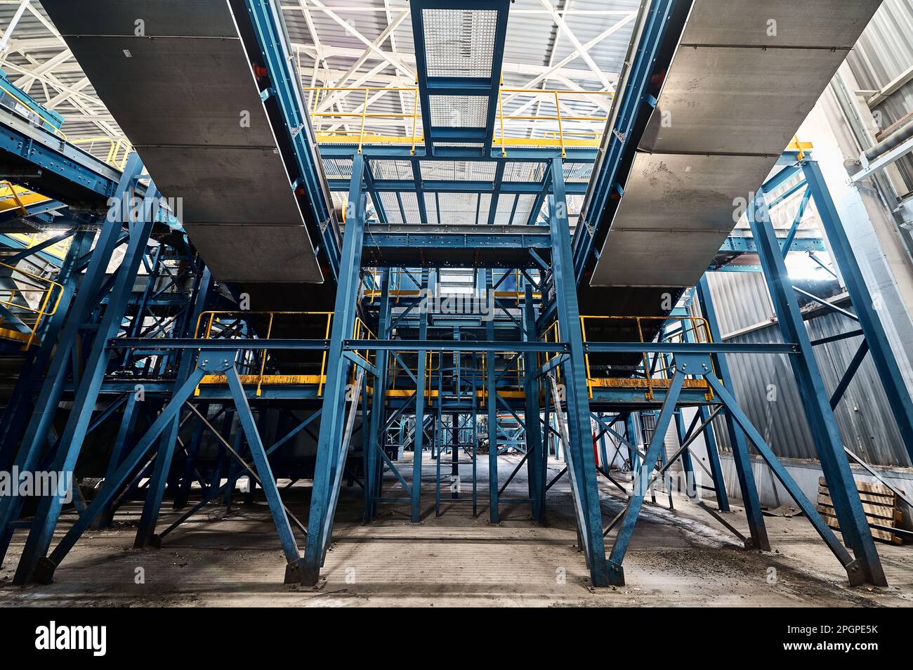 Large production line with conveyors carrying trash at plant Stock Photo - Alamy