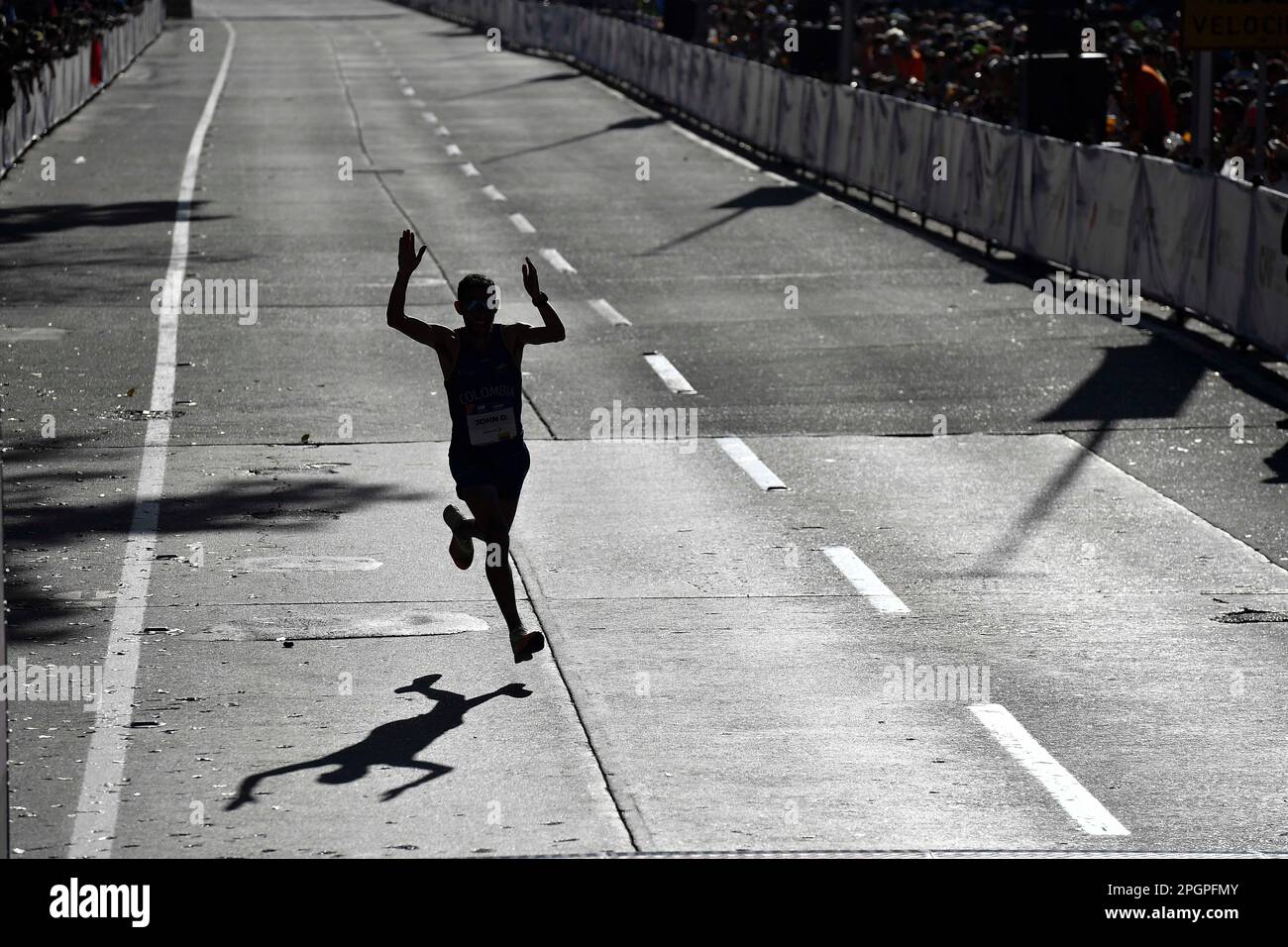 Colombian runner John Tello celebrates his fourth place before crossing ...
