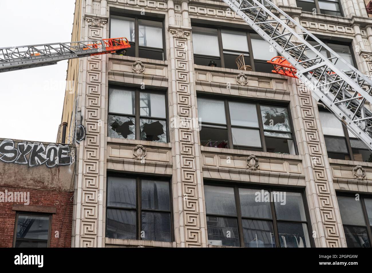 Rescue operation by firefighters to extinguish 2-alarm fire on ...