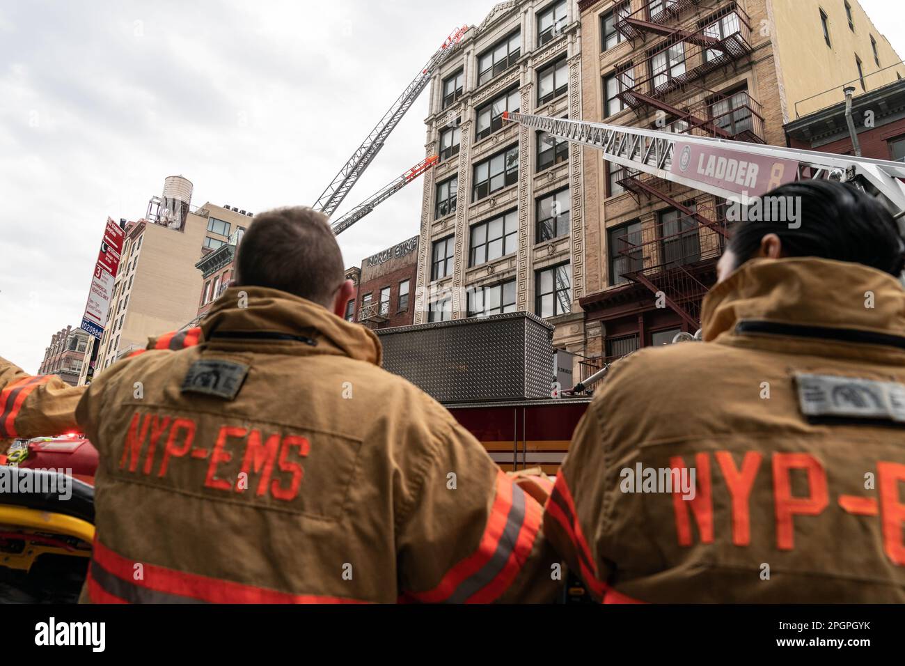 Rescue operation by firefighters to extinguish 2-alarm fire on ...